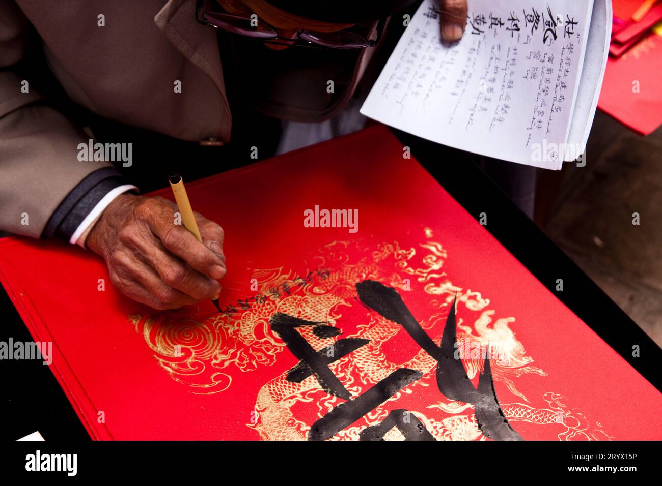 Close to the Temple of Literature, calligraphers show their skills ...