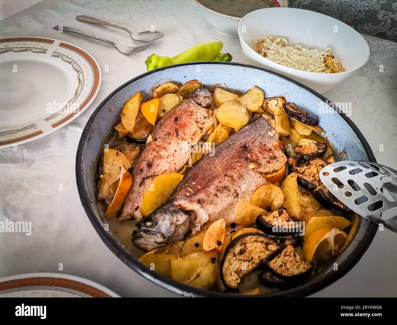 Fried fish with potato, Vinica Macedonia Stock Photo - Alamy