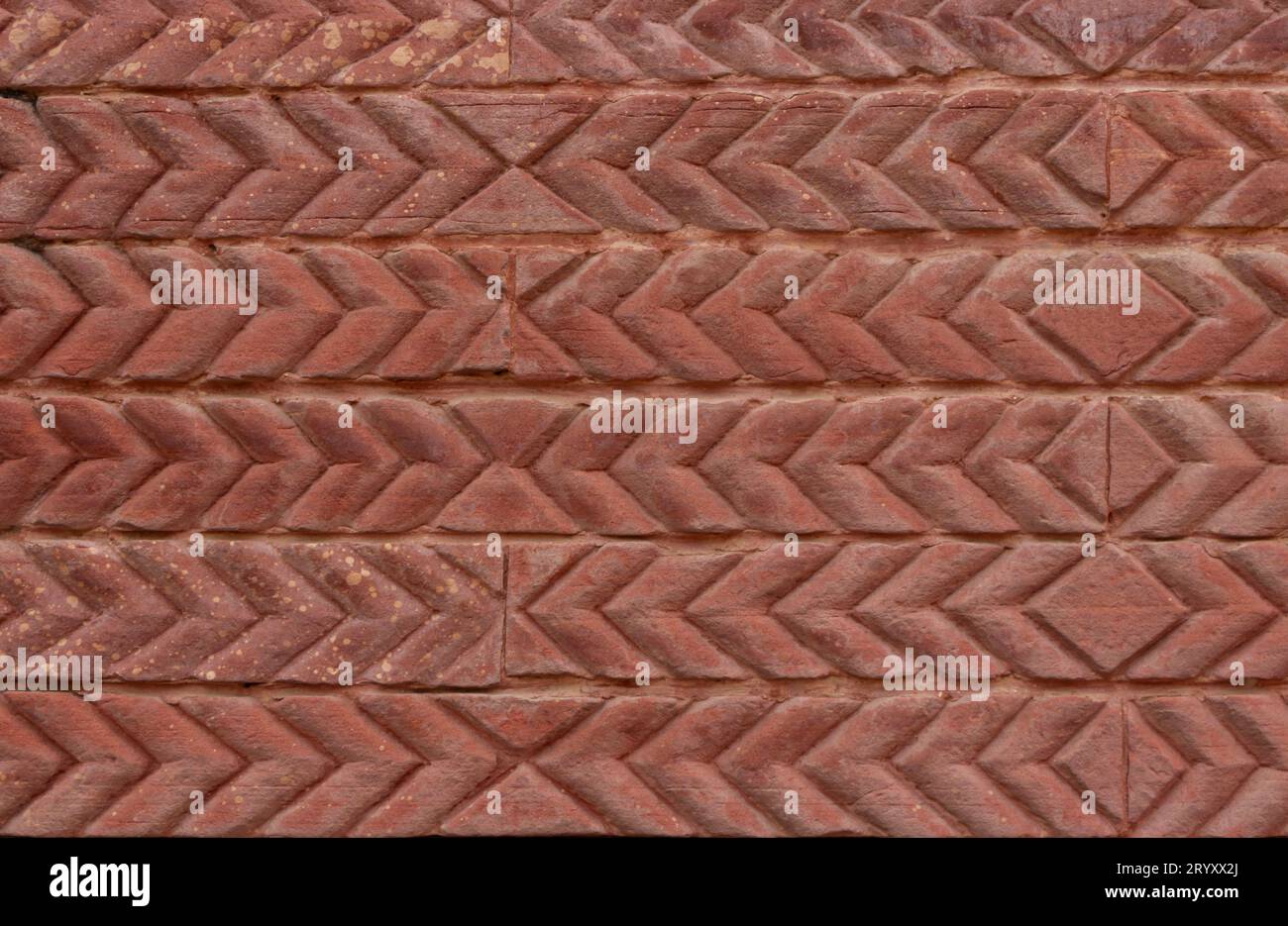 Red brick coloured tile background with sideways chevrons Stock Photo ...