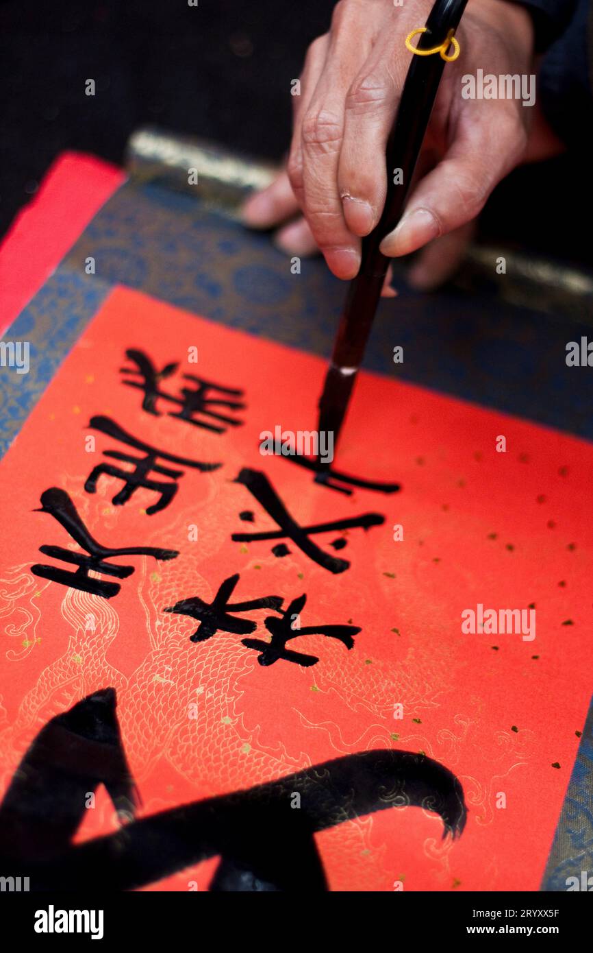 Close to the Temple of Literature, calligraphers show their skills ...