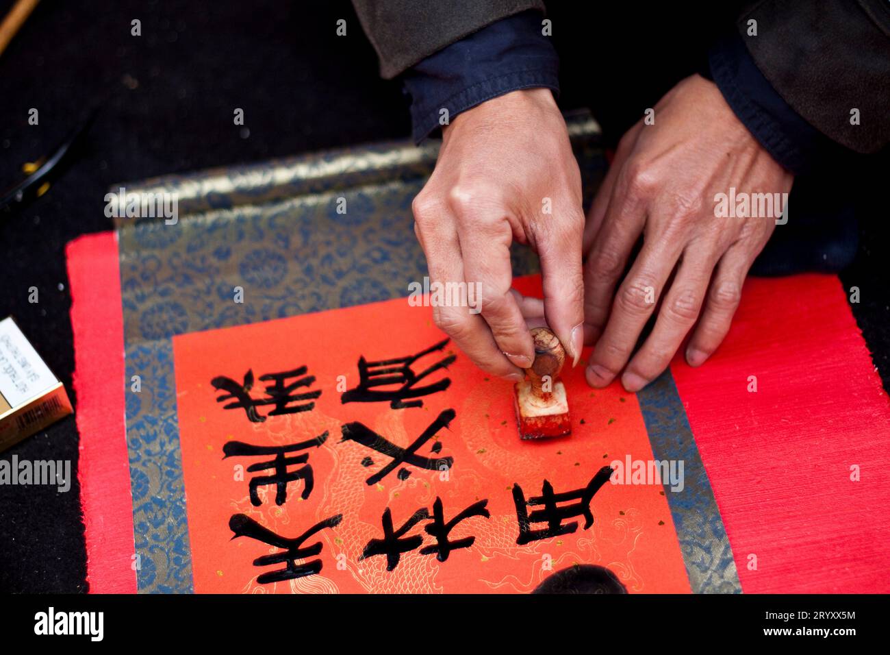 Close to the Temple of Literature, calligraphers show their skills ...