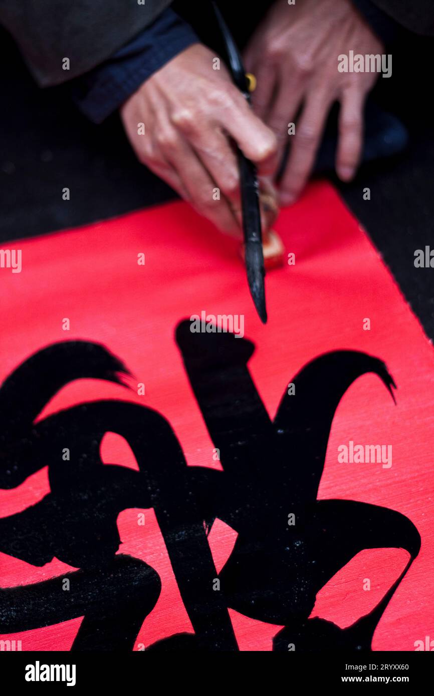 Close to the Temple of Literature, calligraphers show their skills ...