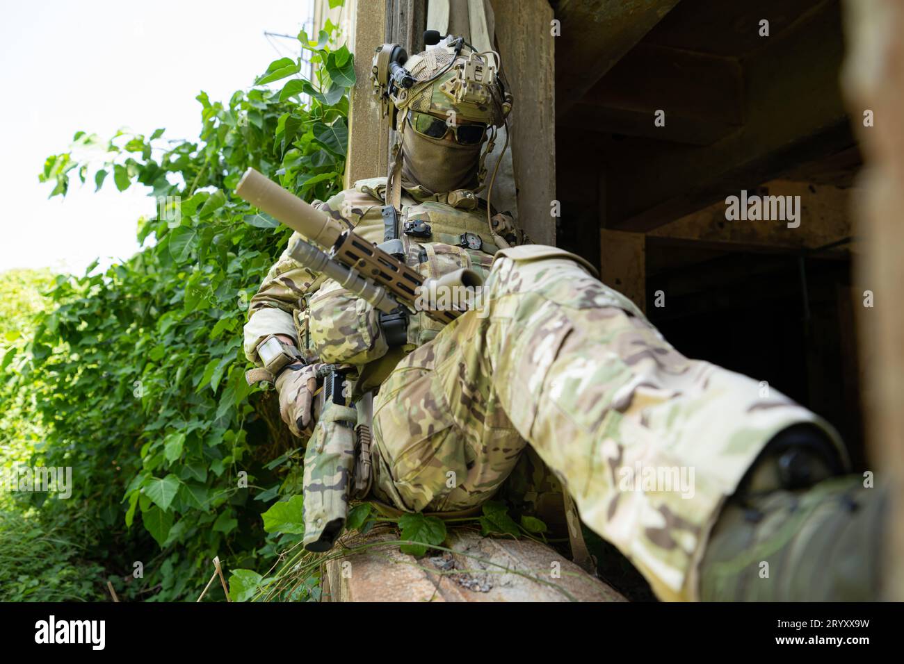 A gun, the personal weapon of a special forces soldier in camouflage ...