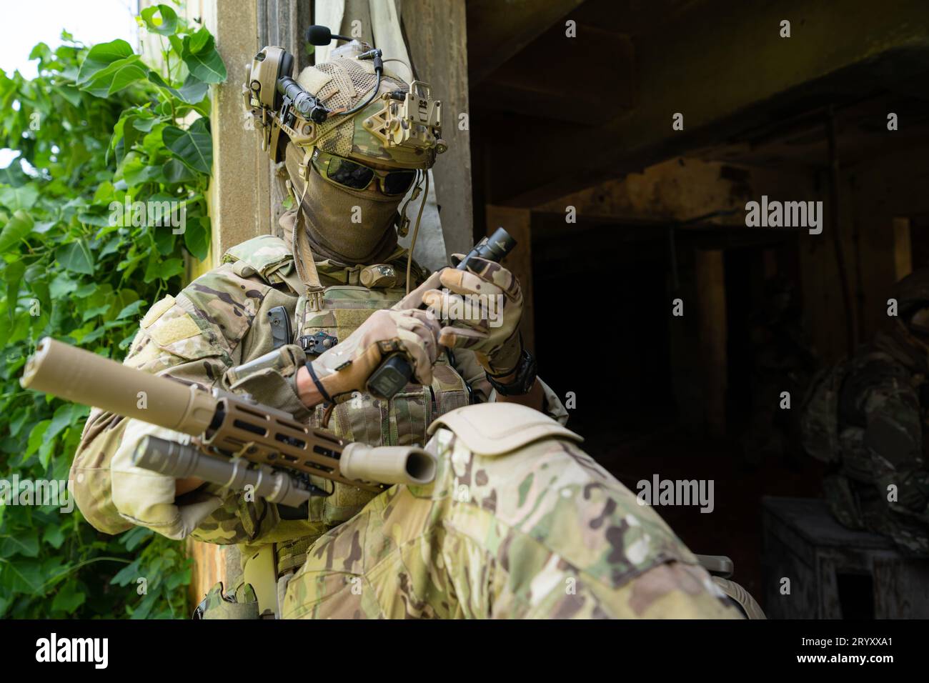 A gun, the personal weapon of a special forces soldier in camouflage ...