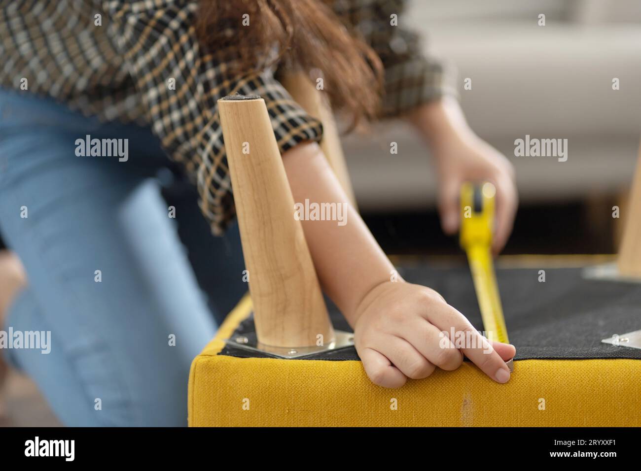 Asian Woman self repairs furniture renovation using equipment to diy ...