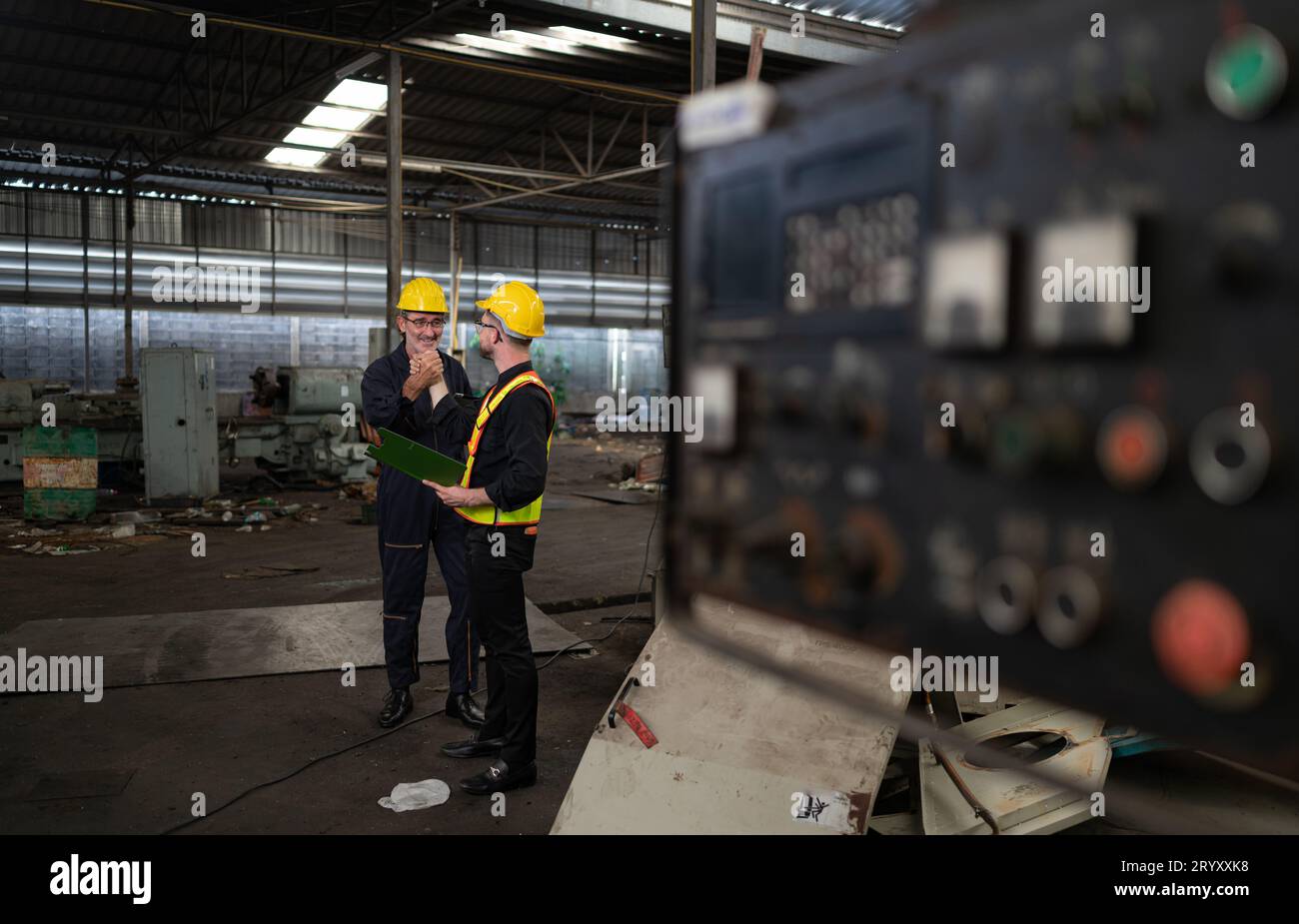 Engineers and technicians Inspect and repair mechanical systems in machine control cabinets. in ...