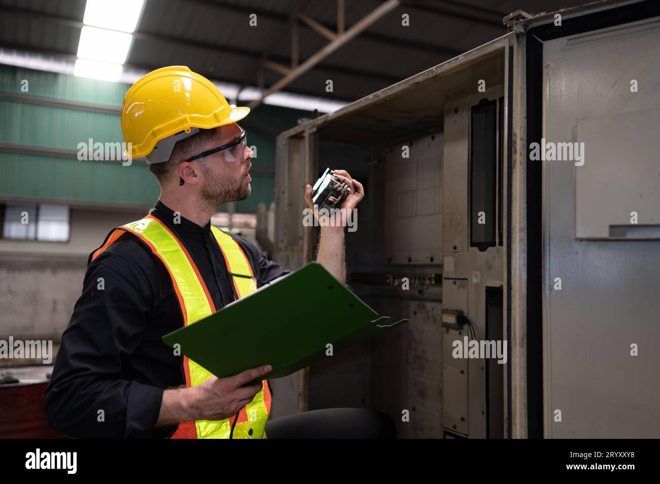 The engineer inspects the electrical system and repairs the mechanical ...