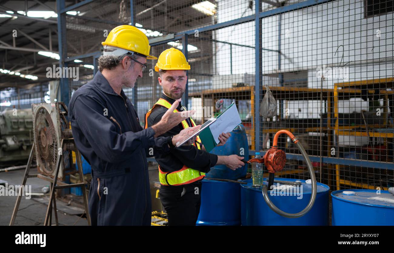Technician and engineer inspecting and measuring the engineering values ...