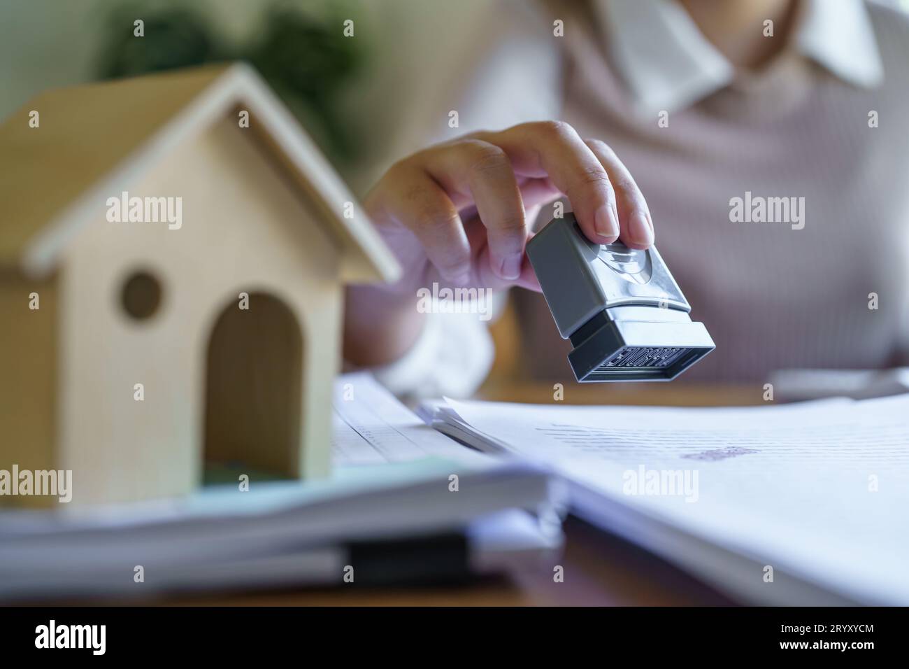 Approved stamp with Business people signing contract making deal with ...