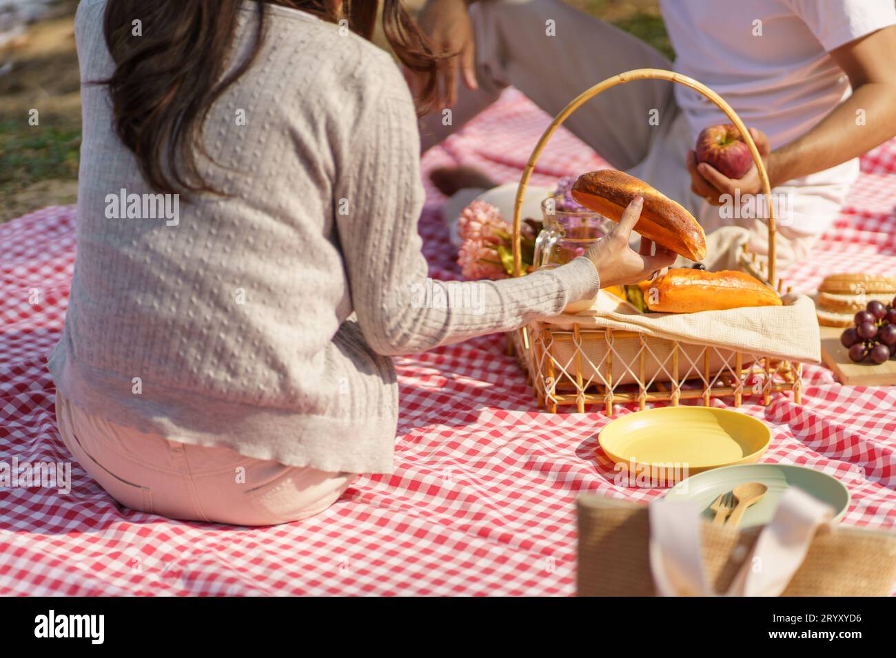 In love couple enjoying picnic time in park outdoors Picnic. happy ...