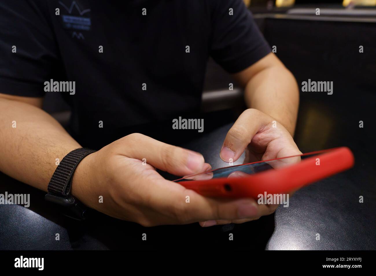 Man playing game on mobile phone. gamer boy playing video games holding ...