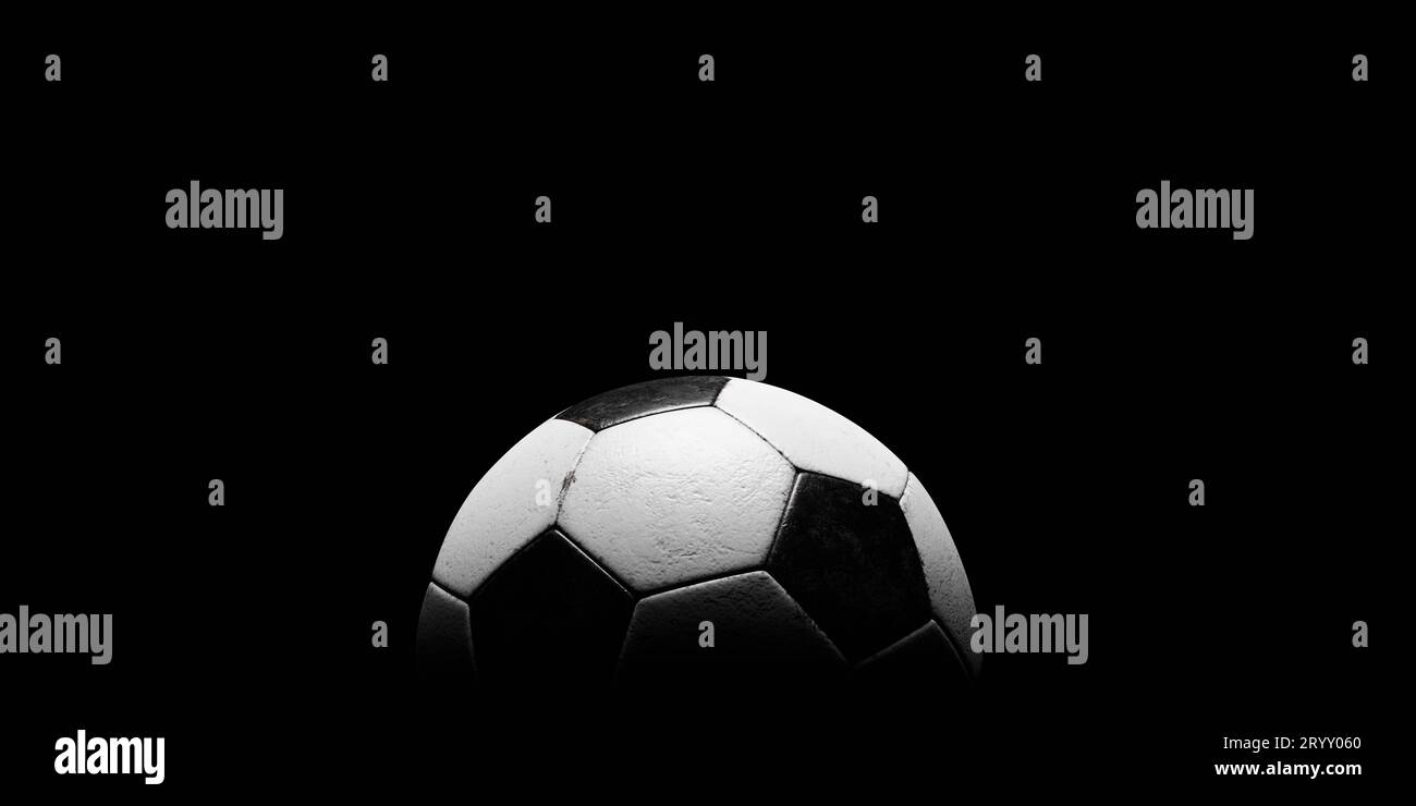 Football or Soccer with spotlight and fade-out shadow in the dark ...