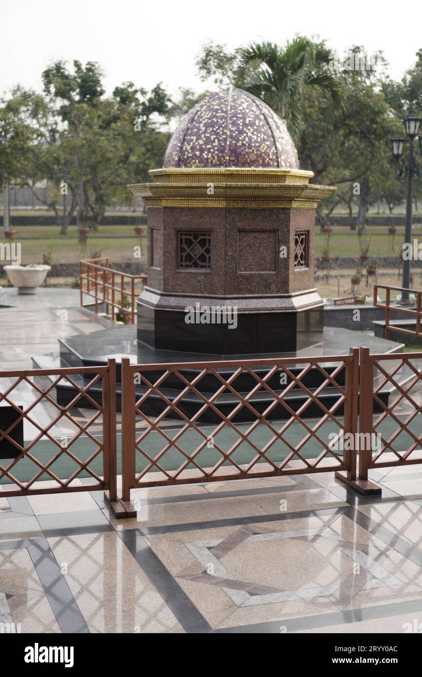 a small domed monument, with ceramic material surrounding it Stock ...
