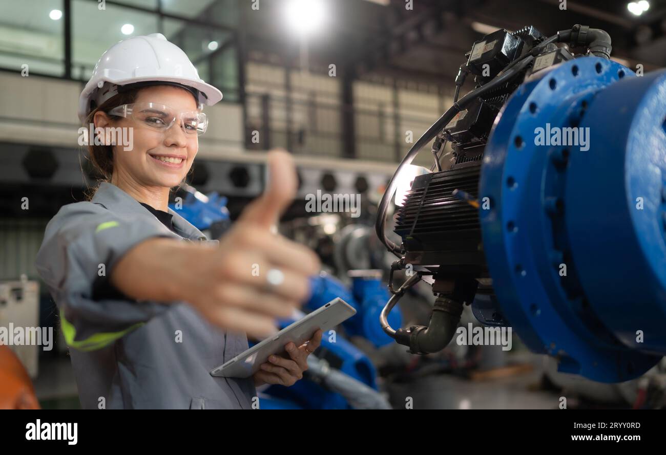 A female engineer completed the updating software and calibrating a ... A female engineer completed the updating software and calibrating a ...