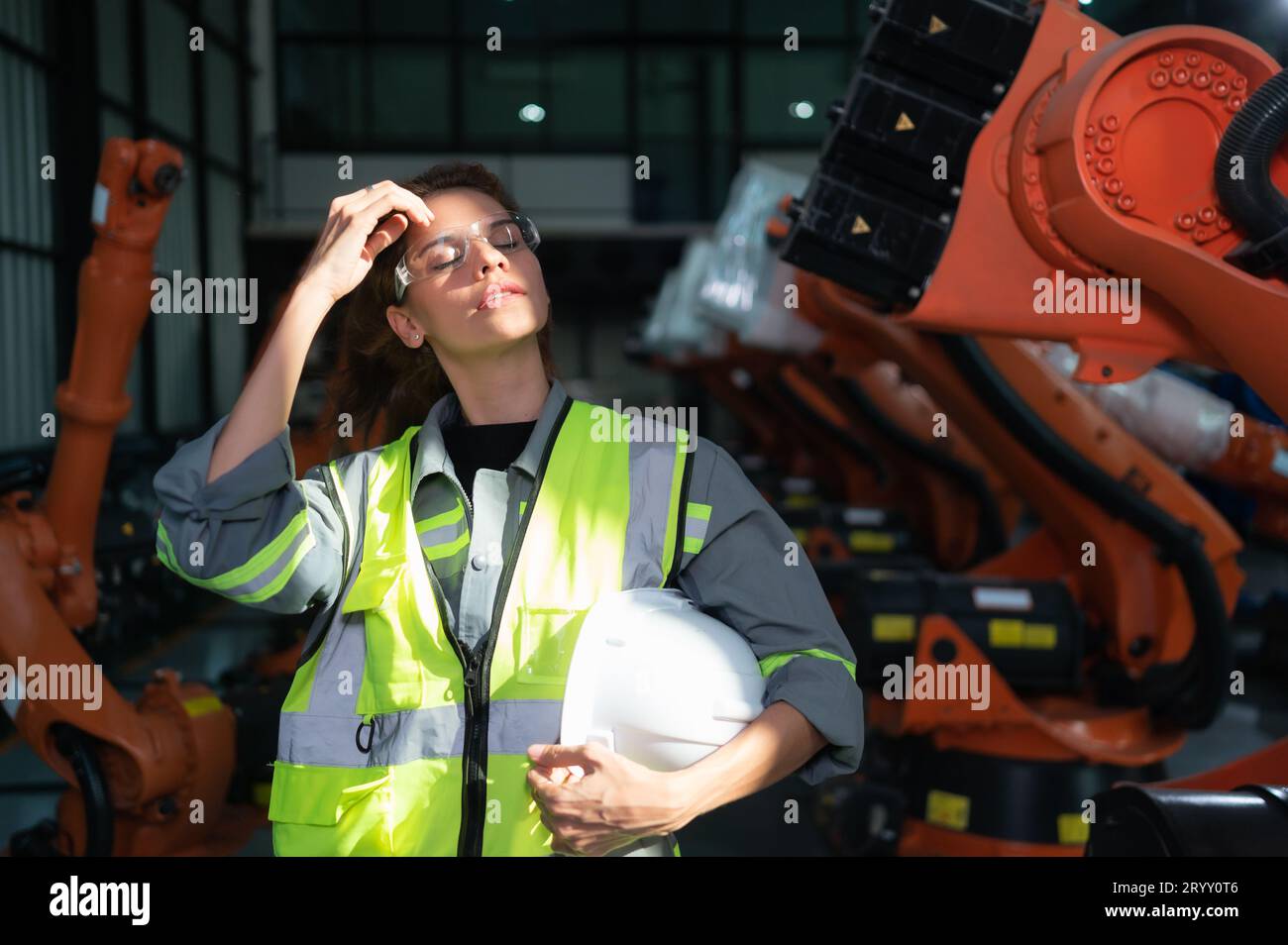 Portrait of female engineer with the mission of auditing, testing ...