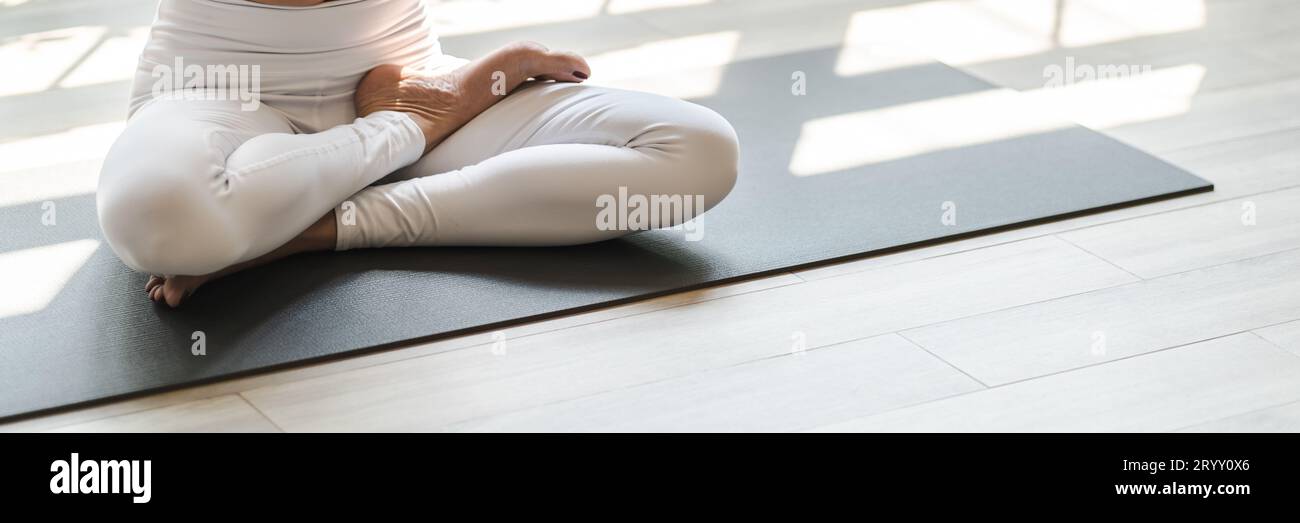 Flexible sport asian woman warming upÂ Fitness woman doing stretch ...