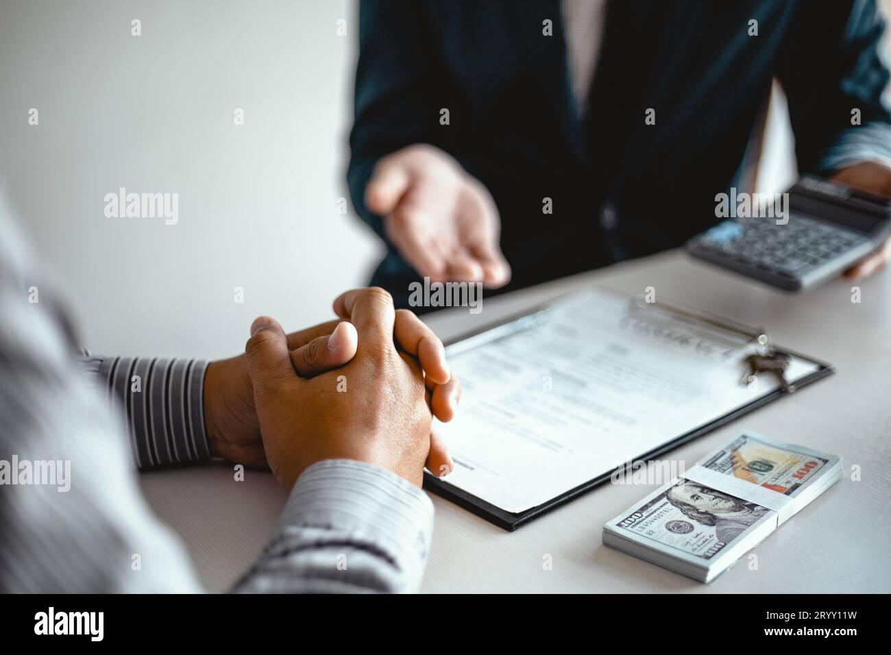 Business people signing contract making a deal with real estate agent ...