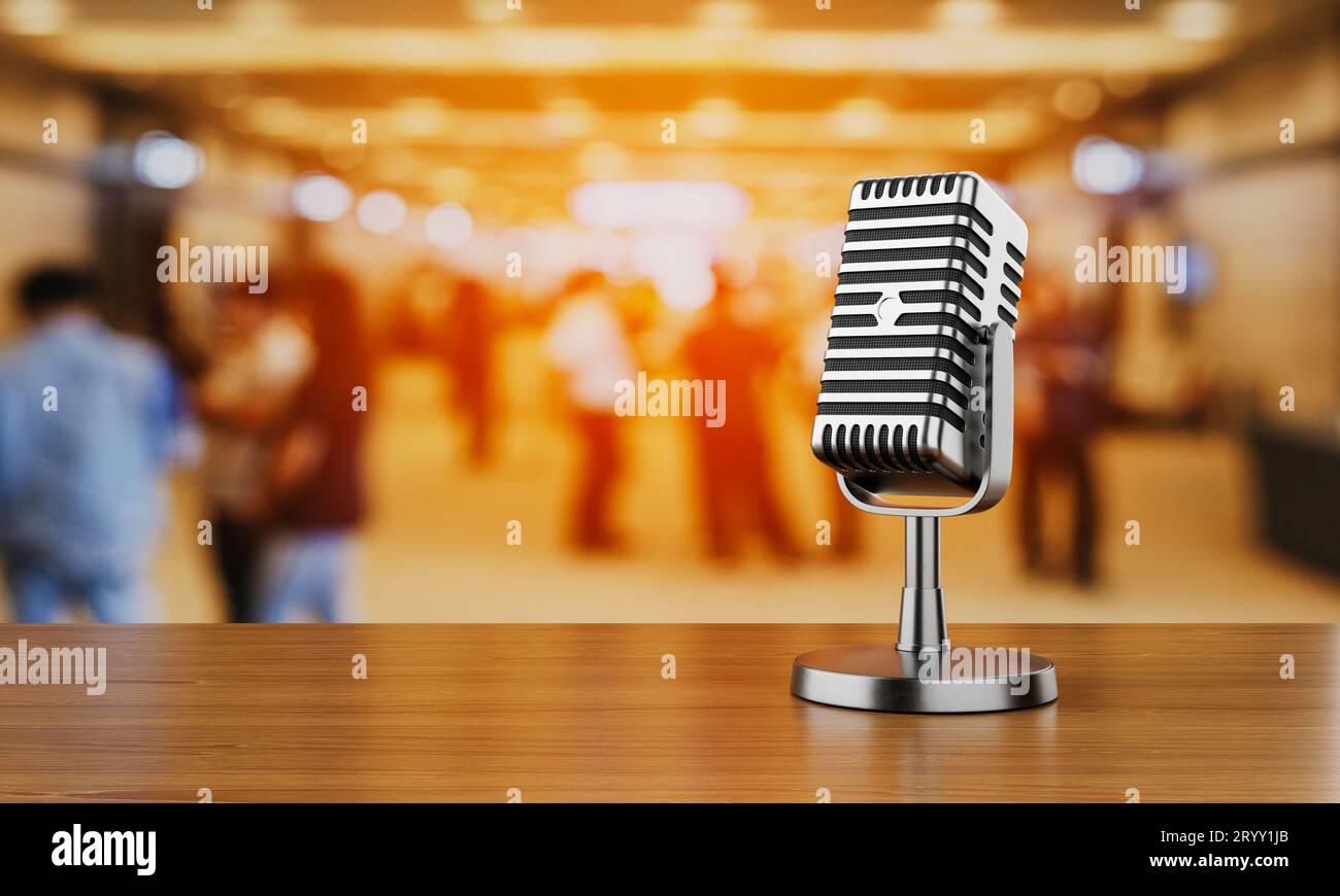 Close up of old vintage style podcast microphone in convention hall and ...