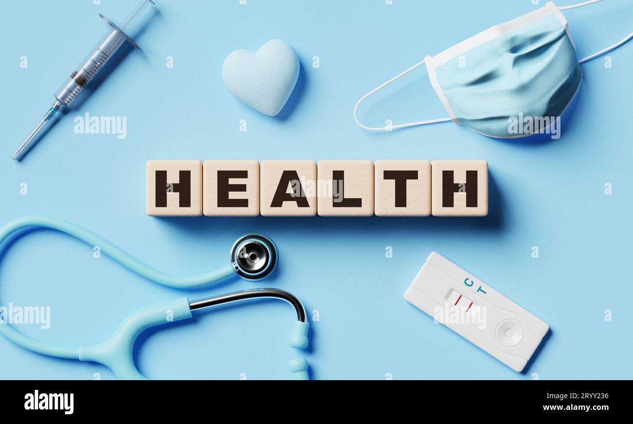 Health wooden word block cubes with medical equipment on blue paper ...