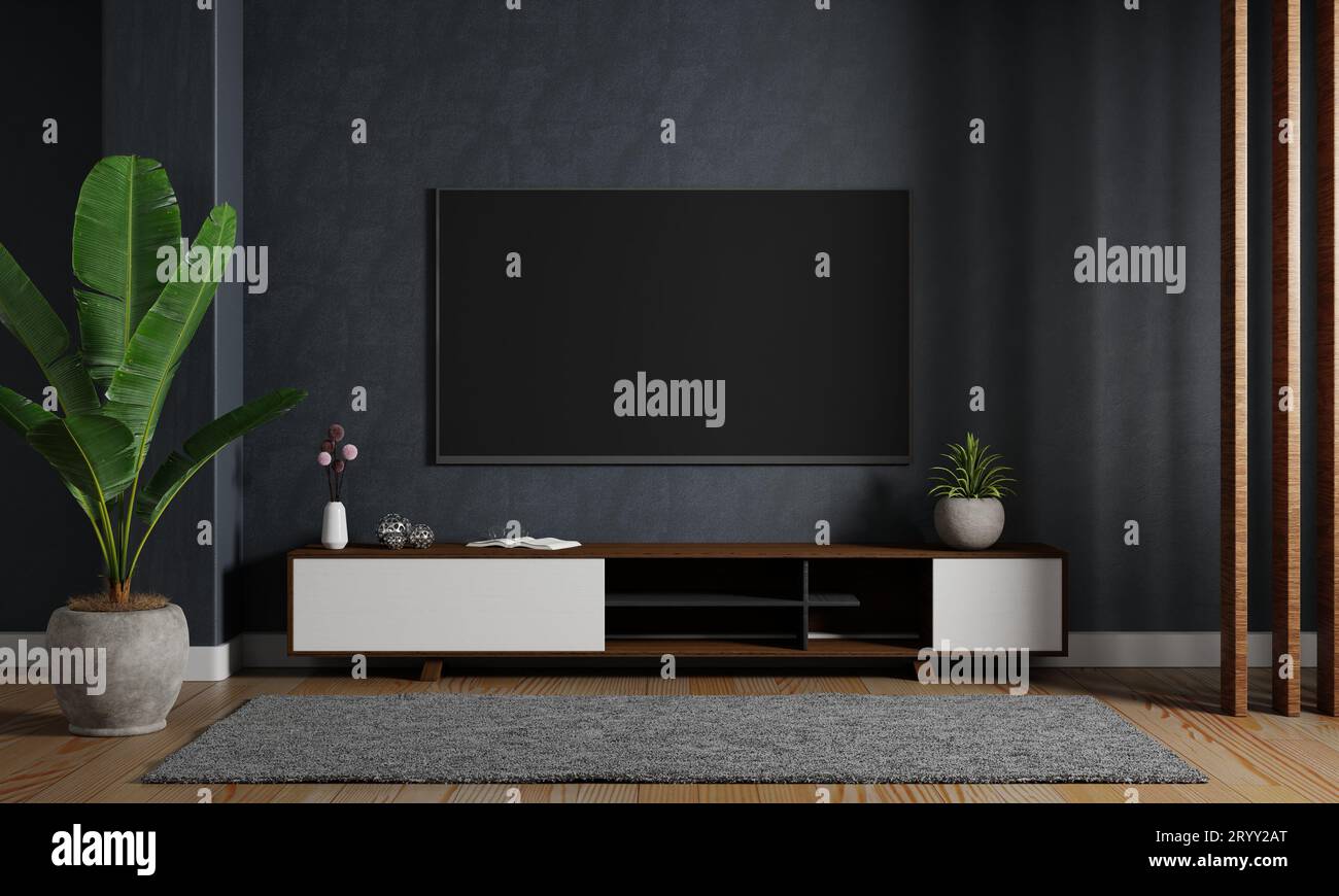 Modern mockup television tv hanging on the dark blue wall background ...