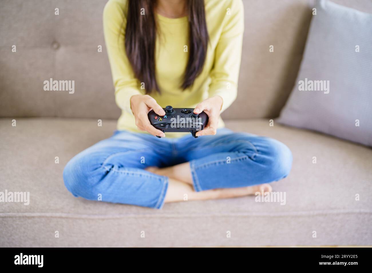 Young Asian woman gamer controller video console playingÂ holding hobby ...