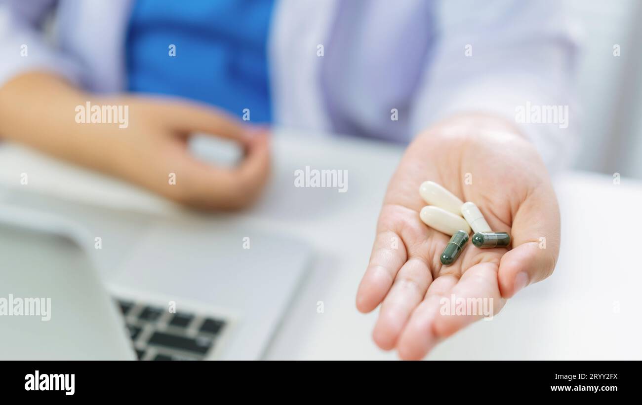 Professional medical doctor hand giving medicine. protect against ...