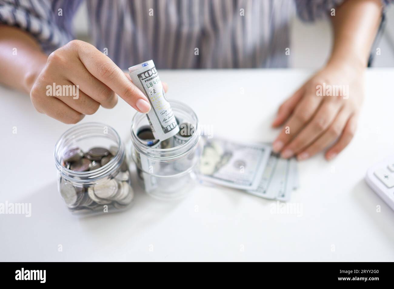 Saving money concept Financial woman hand stack coins money banknotes ...