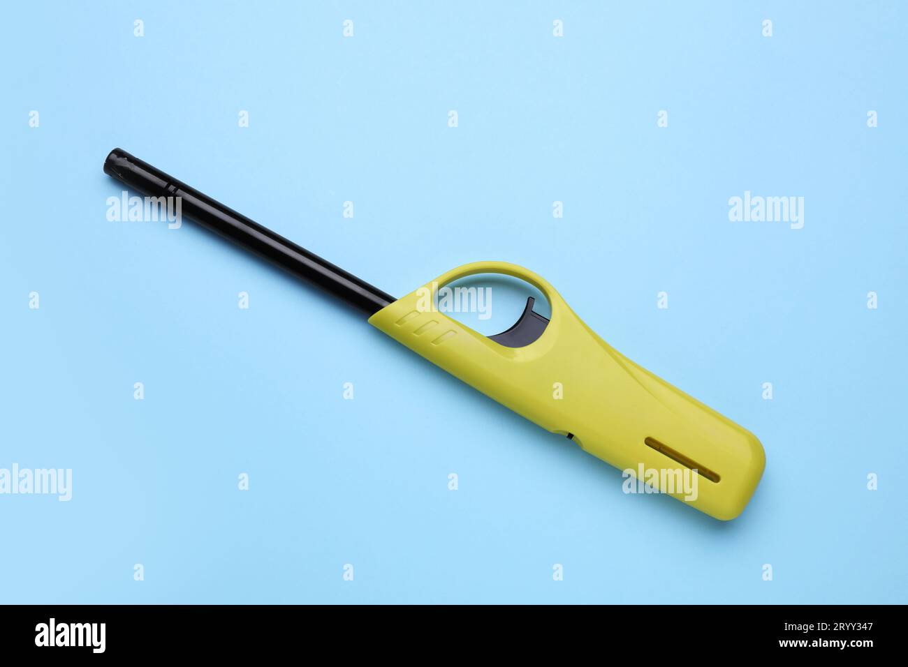 One gas lighter on light blue background, top view Stock Photo - Alamy