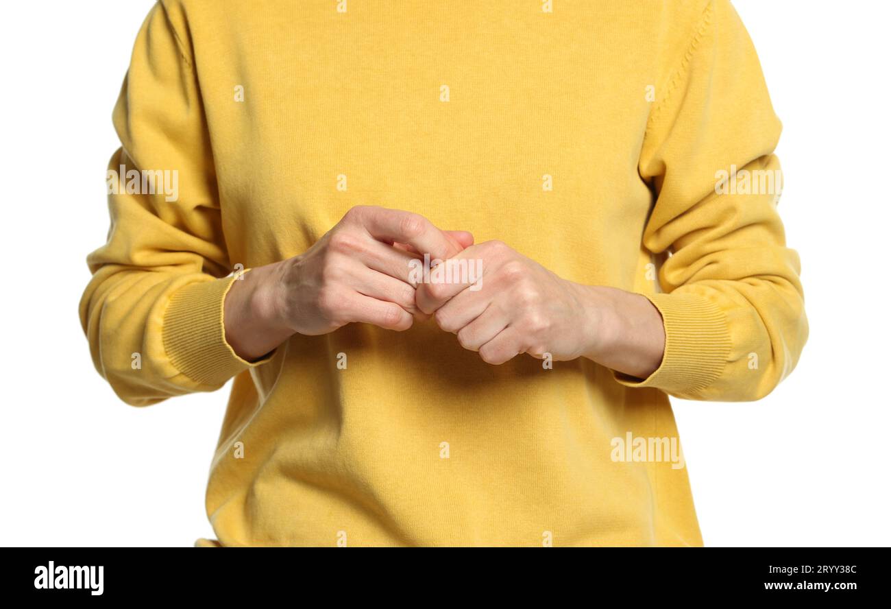 Woman cracking her knuckles on white background, closeup. Bad habit ...