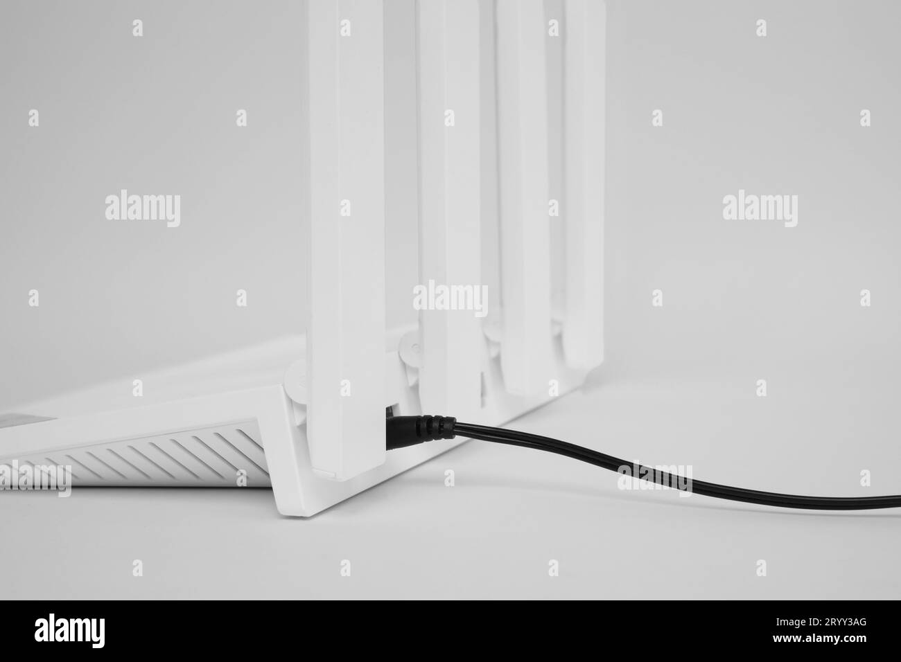 One modern Wi-Fi router on white background, closeup Stock Photo - Alamy