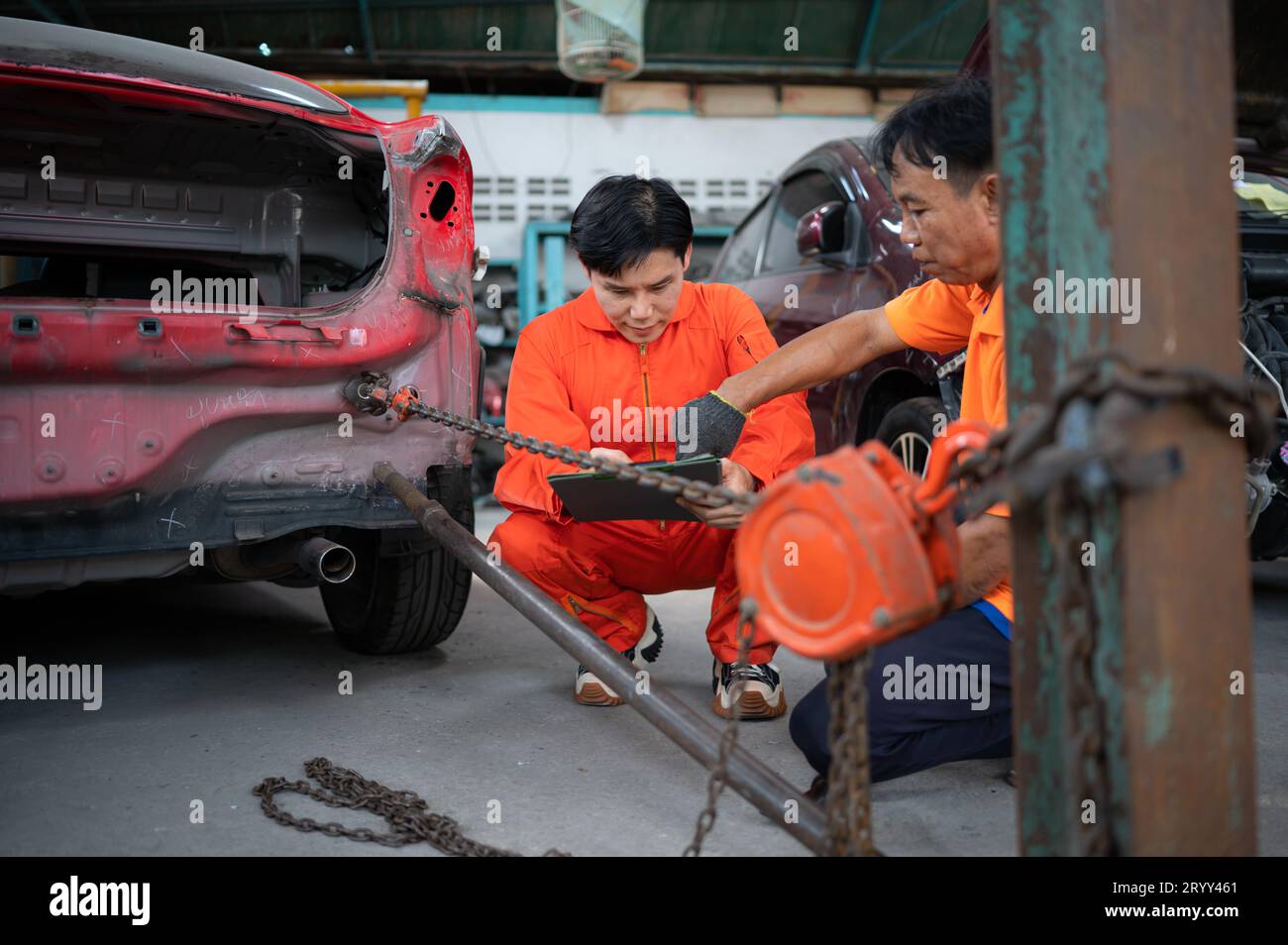 To return the automobile body to its former shape, an auto repair ...