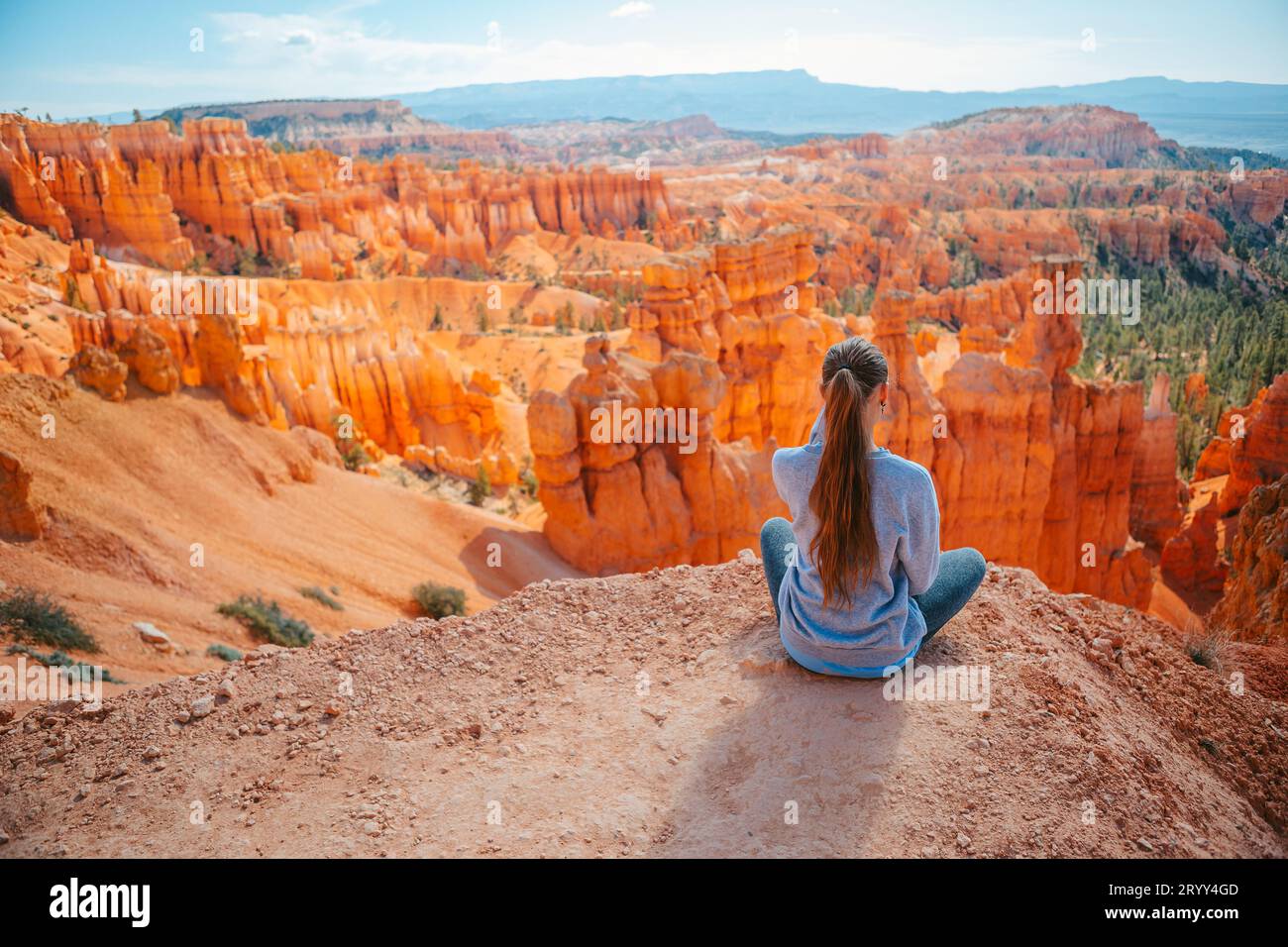 Hiker girl in Bryce Canyon hiking relaxing looking at amazing view ...