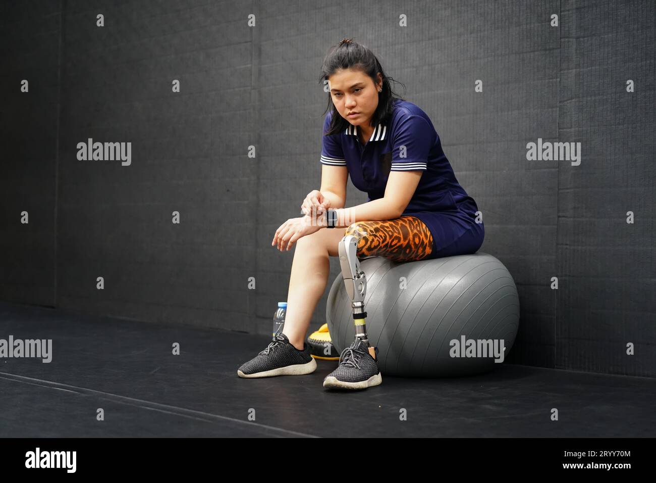 Young female with one prosthetic leg with the practice of using ...