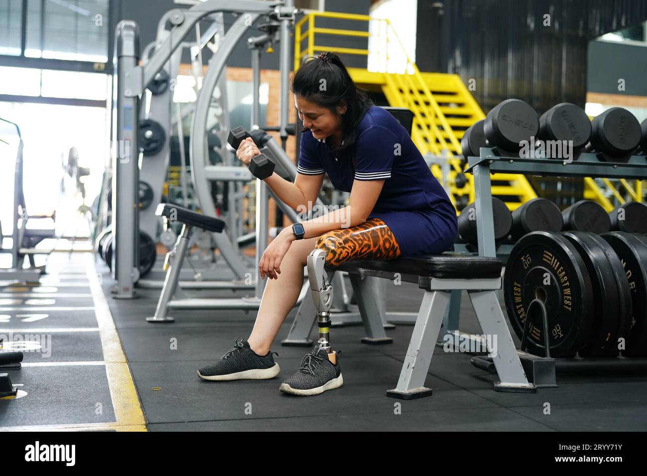Woman disability lifting one hi-res stock photography and images - Alamy
