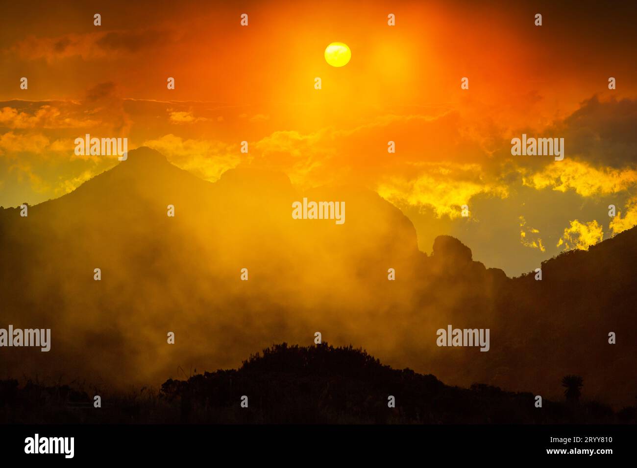 Mountains on sunset Stock Photo - Alamy