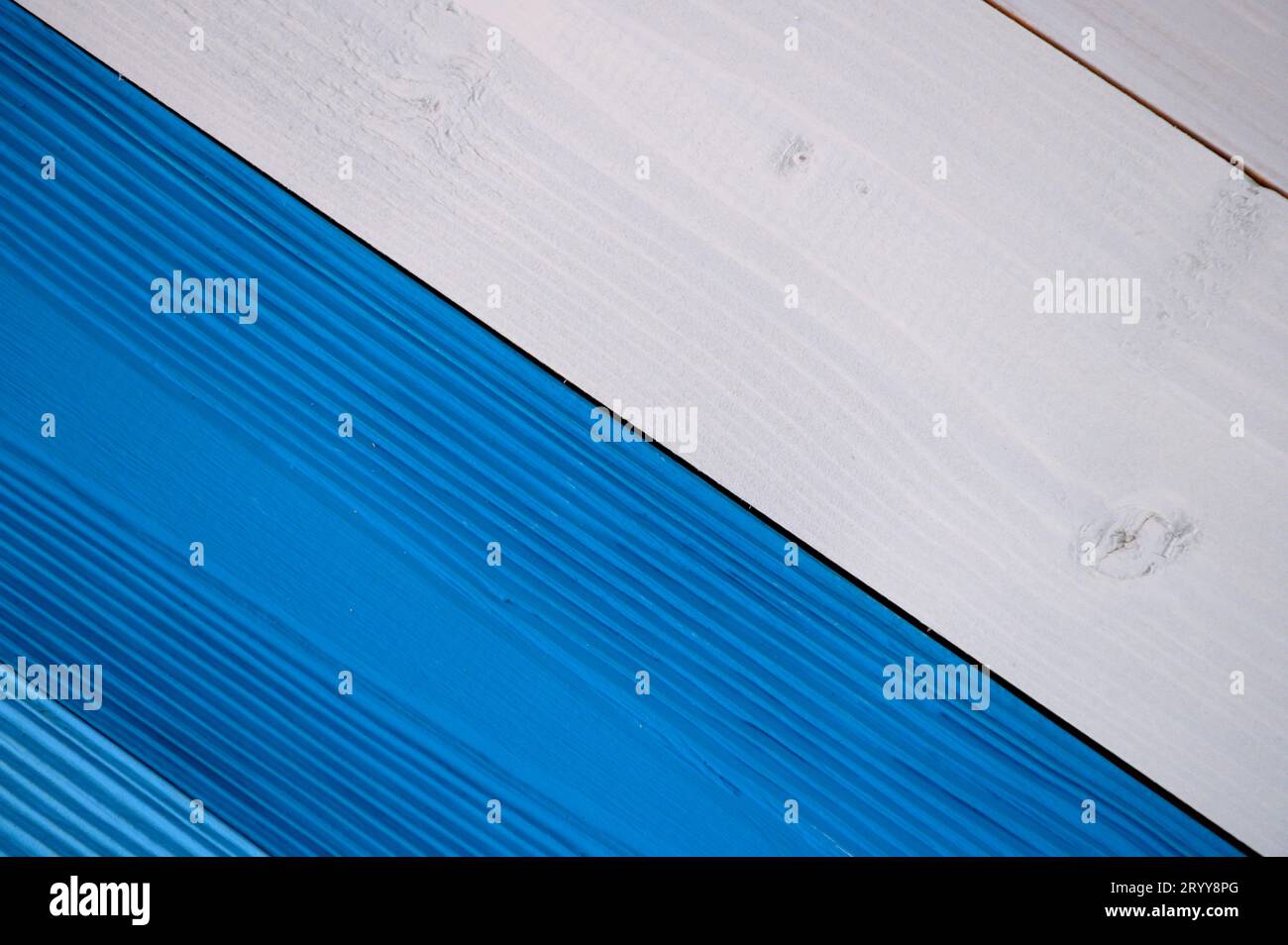 Top diagonal view of blue and white wooden textured background backdrop ...