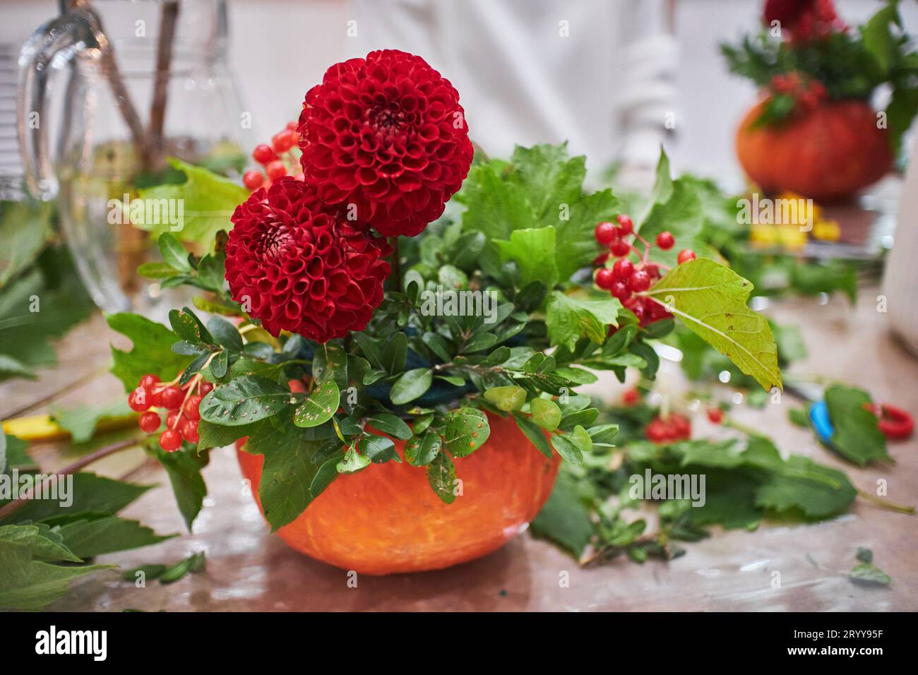 Master class on making bouquets. Autumn bouquet in a pumpkin. Flower ...