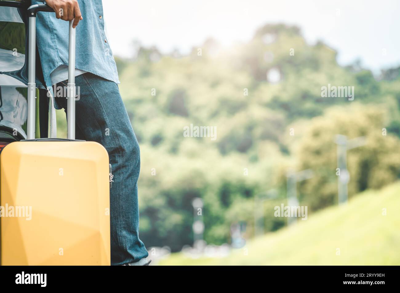 Resting legs on luggage hi-res stock photography and images - Alamy