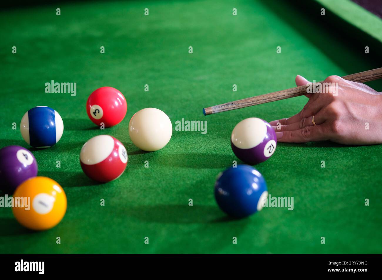 Man's hand and Cue arm playing snooker game or preparing aiming to ...