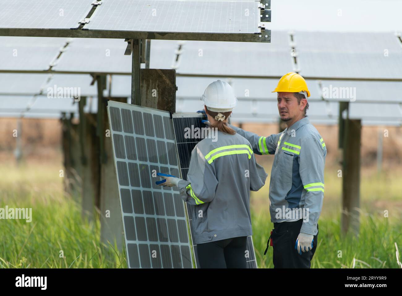 Team of engineers and technicians Must repair the solar panels ...