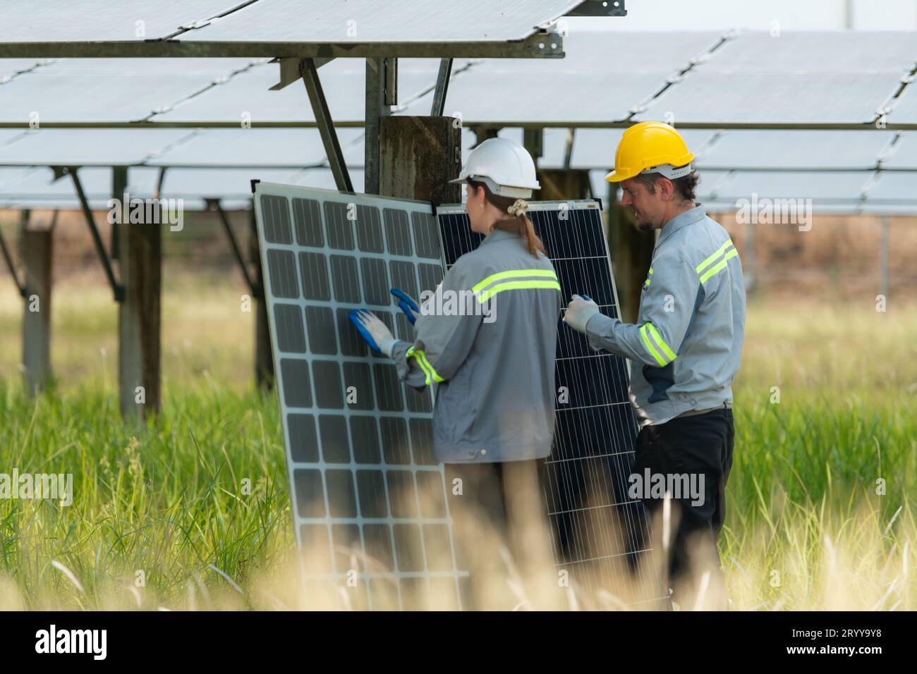 Team of engineers and technicians Must repair the solar panels ...