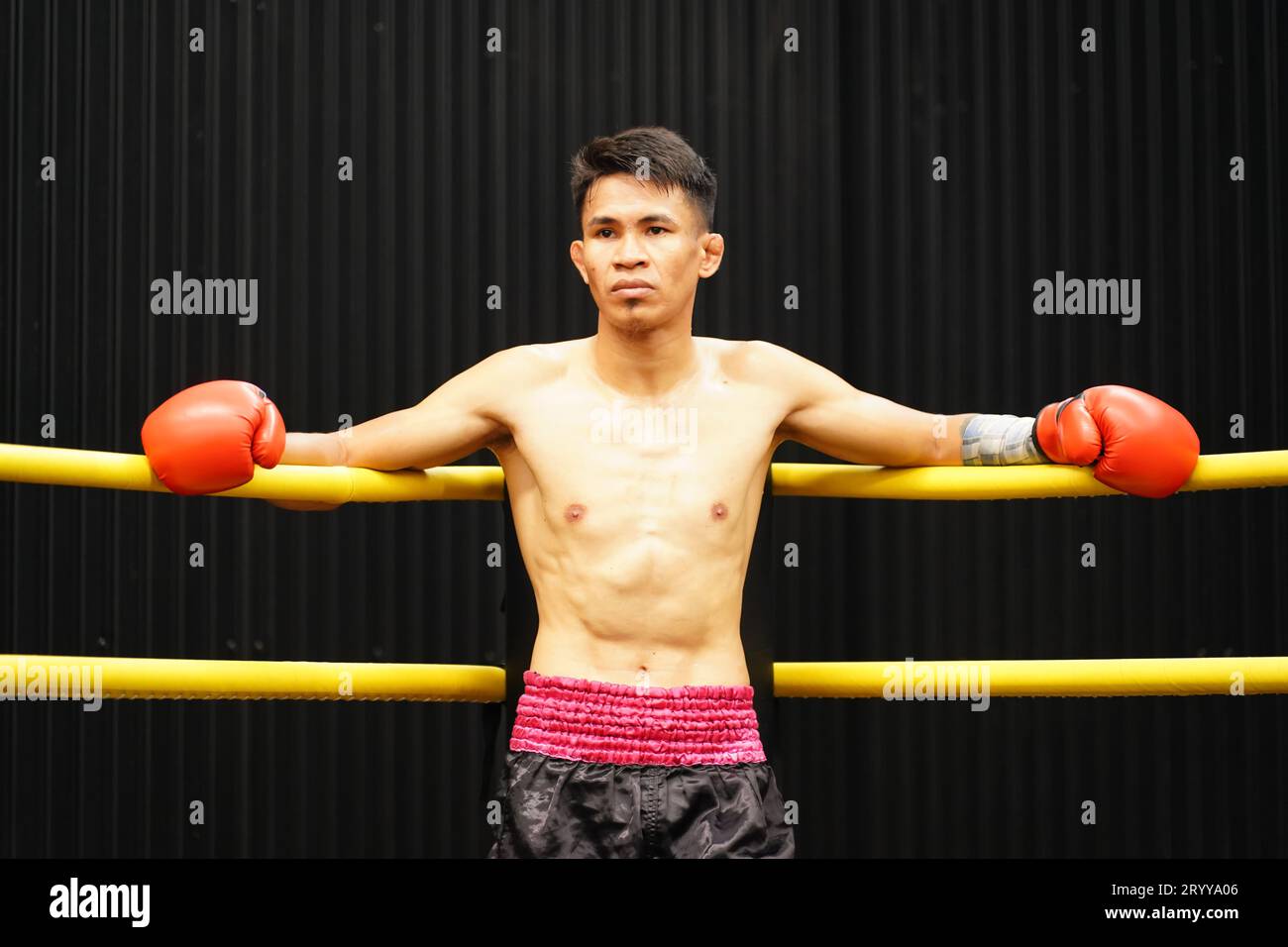Muay Thai, The martial art of Thailand, Boxer sitting in the corner ...