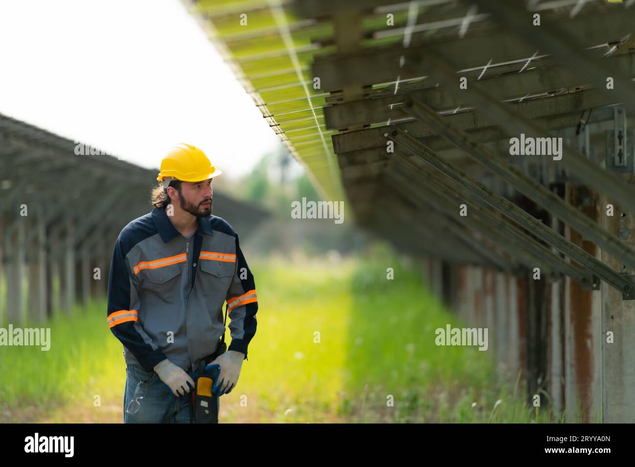 Electrical engineers are inspecting and maintaining solar cells at a ...