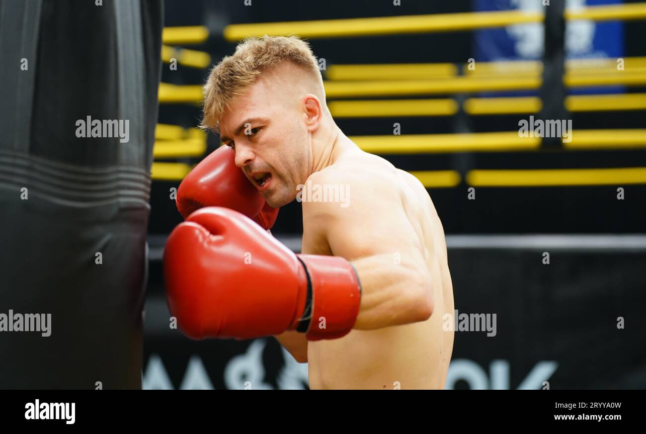 Muay Thai, The martial art of Thailand, Boxer practicing punching with ...