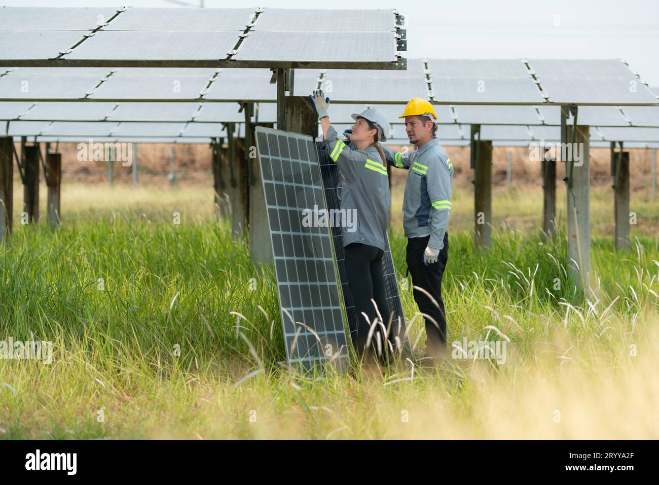 Team of engineers and technicians Must repair the solar panels ...