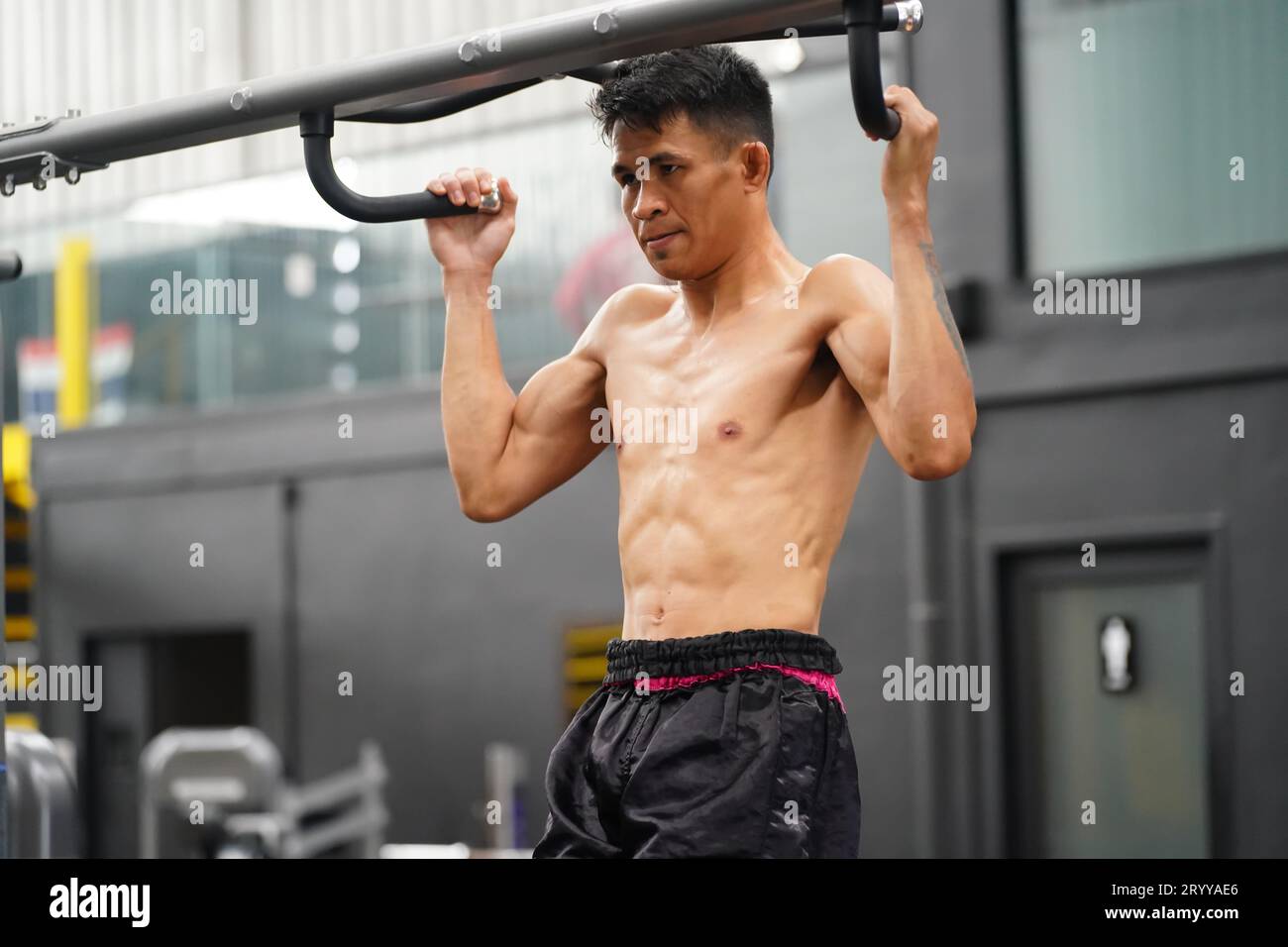 Mixed martial arts fighter going to the gym to build strong muscles To ...