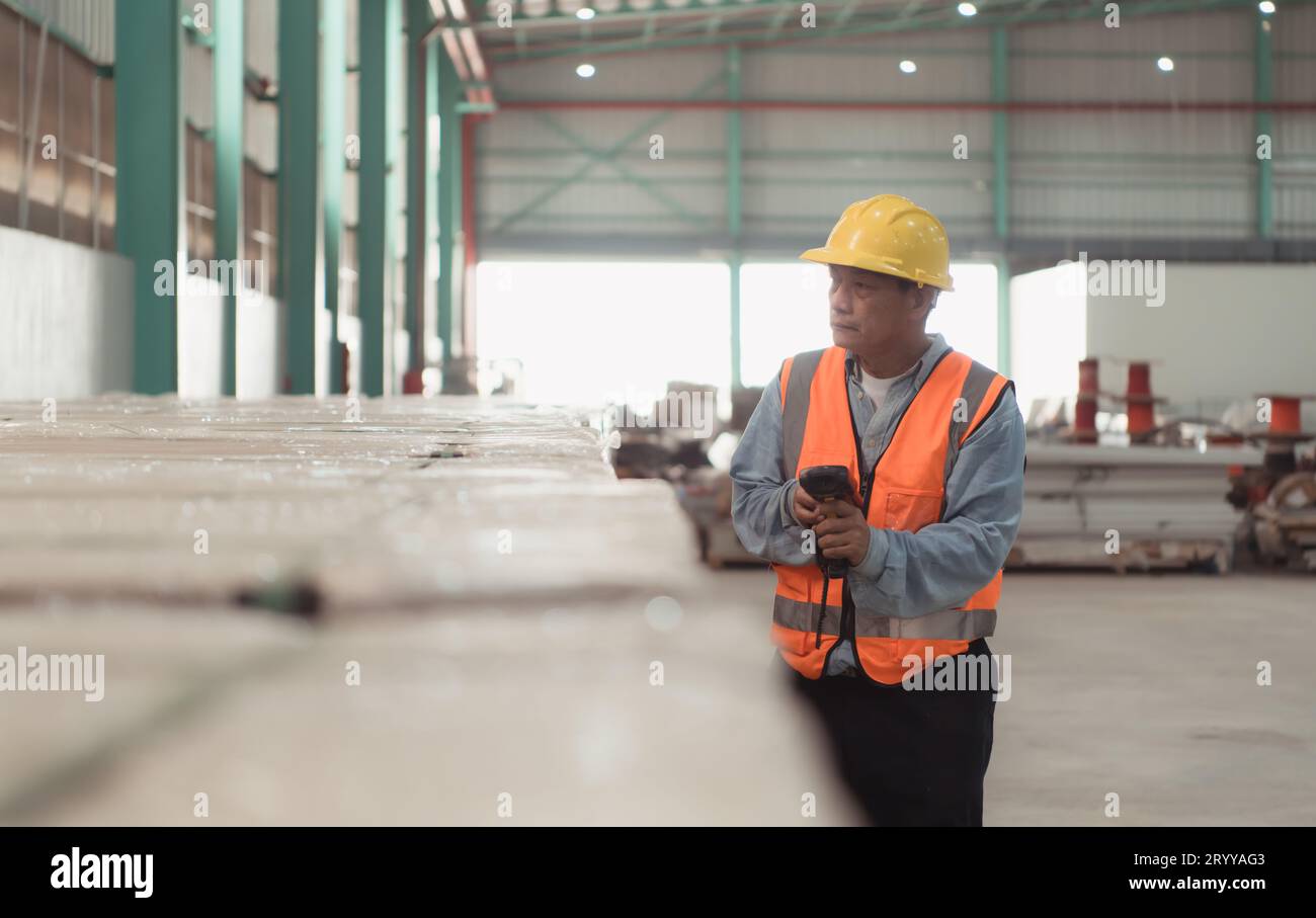 Workers inspect the new warehouse's products. Use barcode scanners to ...