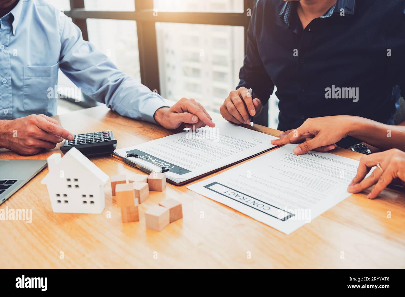 Newly married couple signing contract agreement document for mortgage ...