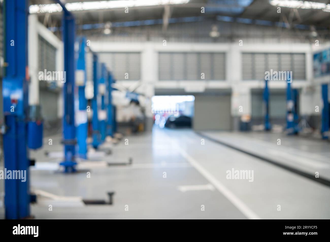 Blurred background of repairing garage with no people. blurry mechanics ...