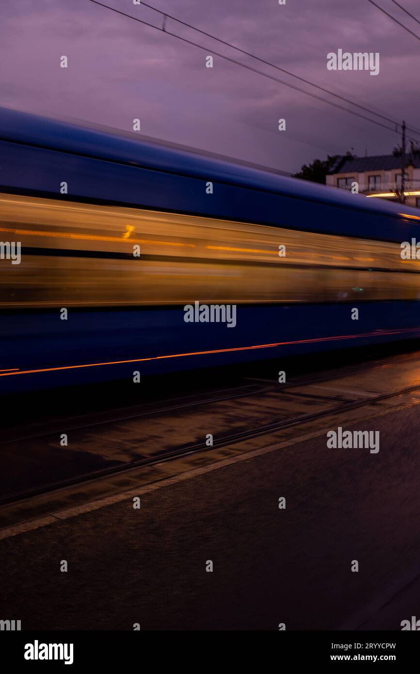 Defocused Lights of cars at night in Krakow bridge. Street line lights ...